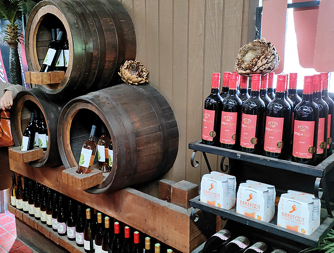 Beyond artichokes: The restaurant's wine display showcases local California vintages nestled in rustic barrels—perfect pairings for your thorny vegetable feast.