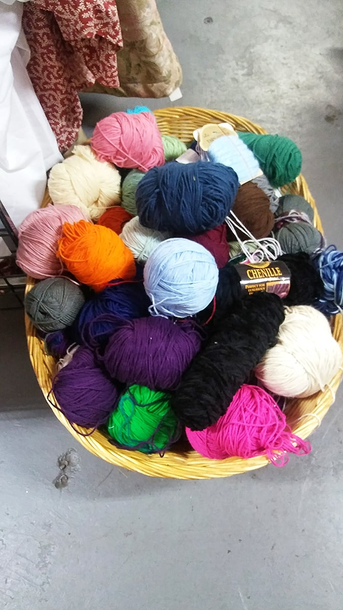 A rainbow you can touch! This basket of yarn holds infinite possibilities—sweaters, scarves, and projects abandoned by crafters with ambition exceeding patience.