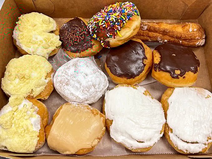 A dozen donuts packed with care, ready to transform any ordinary day into something absolutely extraordinary.