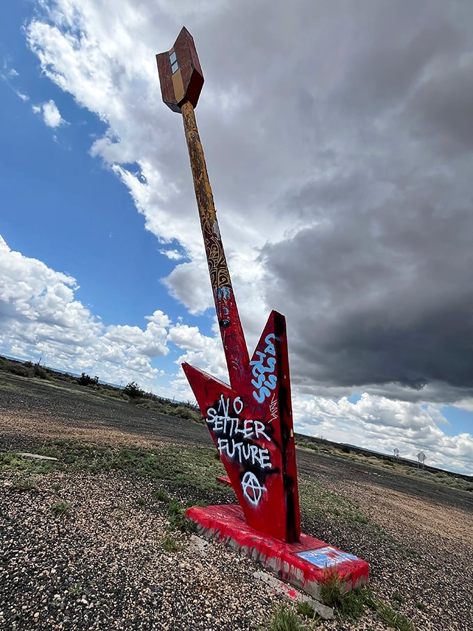 Political statements and artistic expression merge on the arrow's surface—a constantly evolving canvas reflecting changing American attitudes.