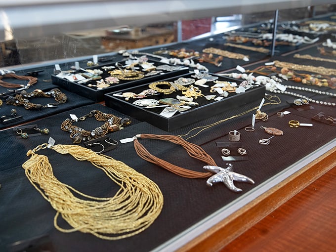 Gold chains and statement pieces galore—jewelry that whispers "Palm Beach" but costs more like "practical budget."