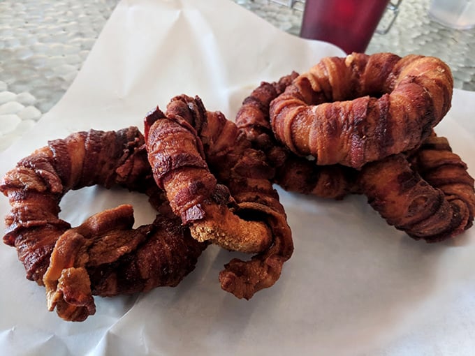 Bacon-wrapped onion rings that answer the eternal question: "How do we make onion rings even more irresistible?" Bacon. Always bacon.