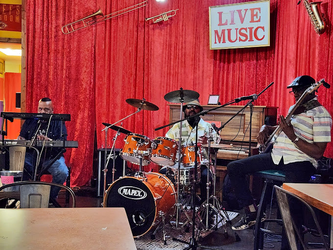 Live music that feeds your soul while the kitchen feeds your body. These musicians aren't just playing—they're seasoning the atmosphere.