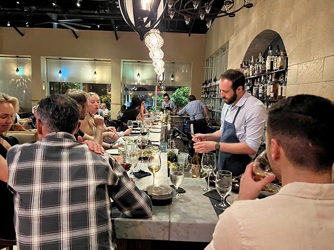 The bar at Zahav isn't just where drinks are made—it's where culinary stories unfold between attentive staff and eager diners.