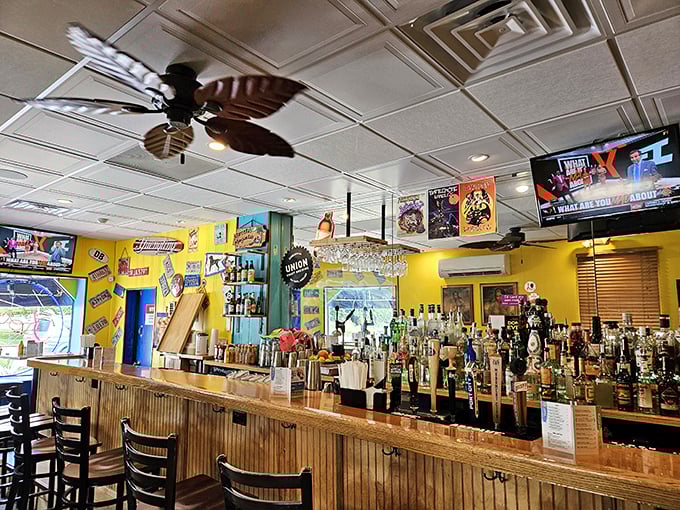 The bar area—where Baltimore sports fans, neighborhood regulars, and crab cake pilgrims converge in delicious harmony.