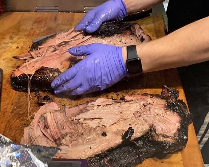 Watching brisket being sliced is the adult equivalent of a kid seeing Disney World for the first time. That knife gliding through meat? Pure theater.
