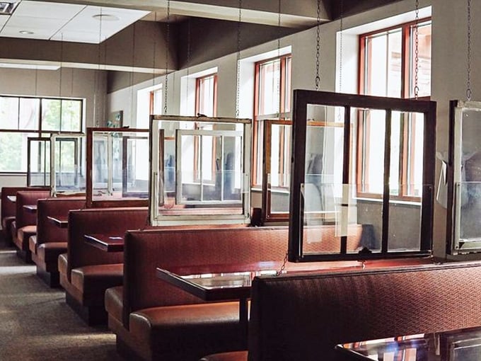 Social distancing, Kelly's style. These hanging dividers were probably installed during pandemic times, but they also work for pretending you're in your own private dining club.