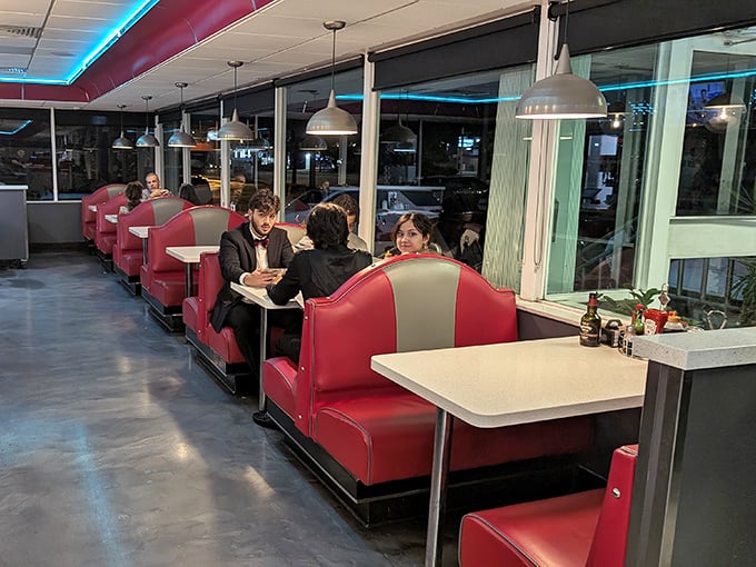 Late-night conversations in vinyl booths—where friendships deepen and life decisions are made over coffee refills.