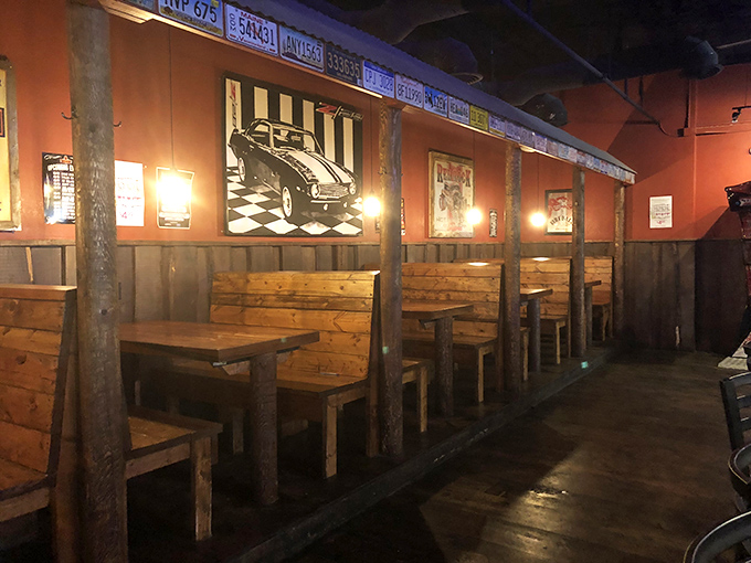 Rustic wooden booths offer the perfect vantage point for people-watching while you contemplate a second helping of those legendary wings.