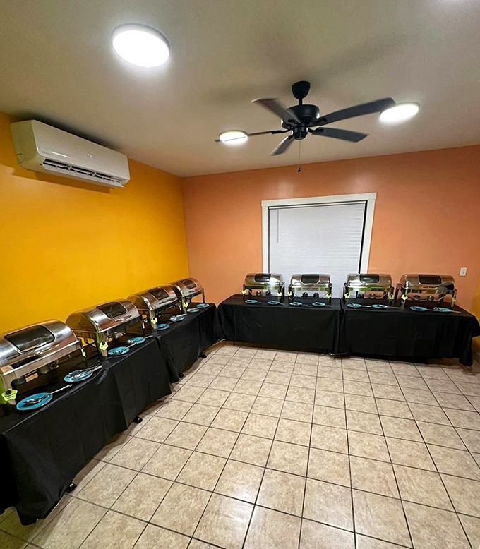 A buffet spread ready to feed a crowd with Caribbean hospitality. Each dish maintains its dignity even in mass-quantity form.