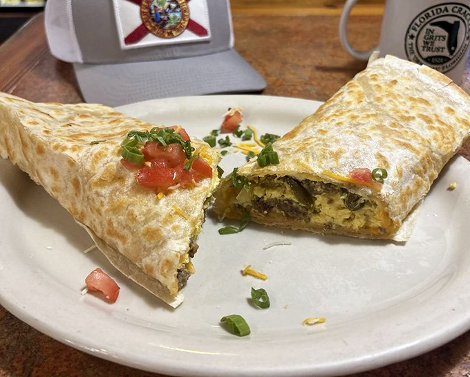The burrito, sliced open to reveal its secrets, is like Florida itself—diverse, colorful, and surprisingly well put together.