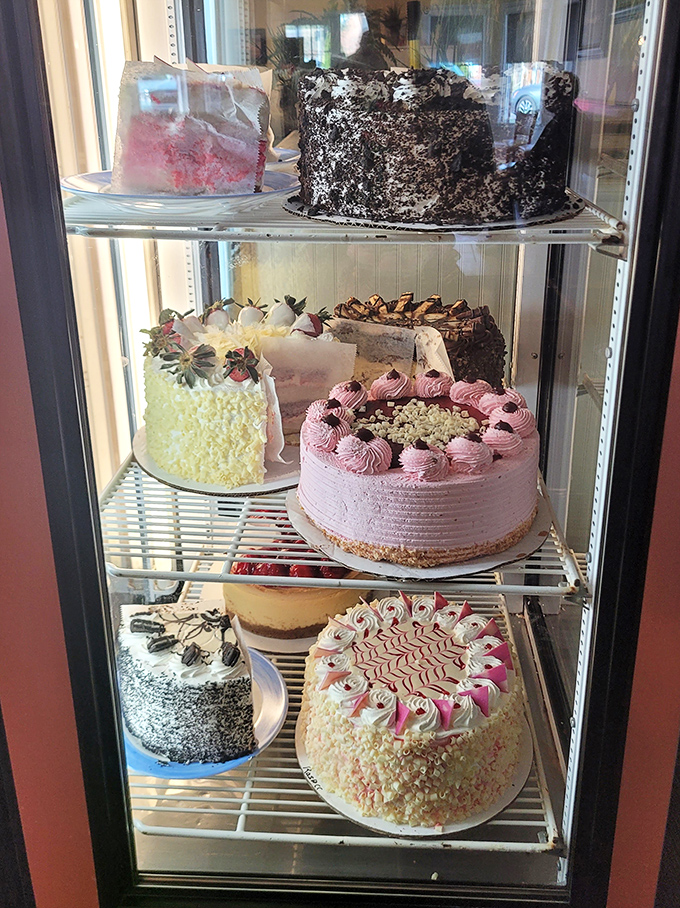 The dessert case – where willpower goes to die after you've promised yourself "just seafood today."