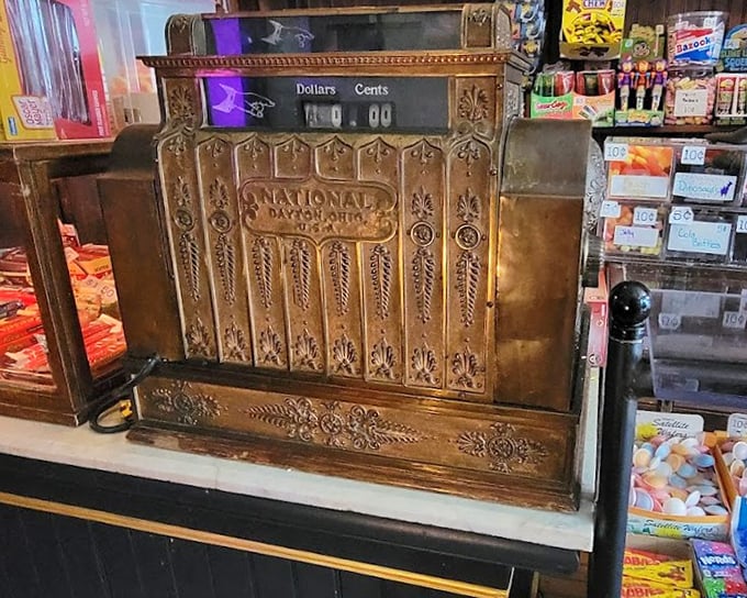 The antique National cash register doesn't just ring up sales—it rings up memories, each transaction a ticket to nostalgia.
