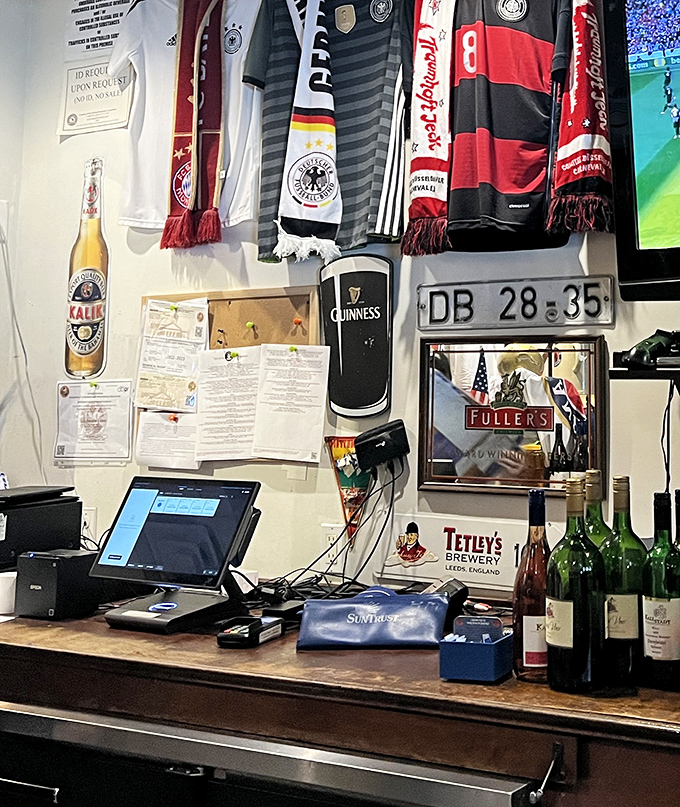 Where German football jerseys meet beer signage in perfect harmony. This isn't decoration—it's a shrine to the things that make life worth living.