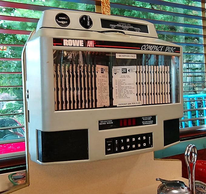 This vintage tabletop jukebox isn't just decoration—it's a time machine offering three minutes of nostalgia for just a quarter.