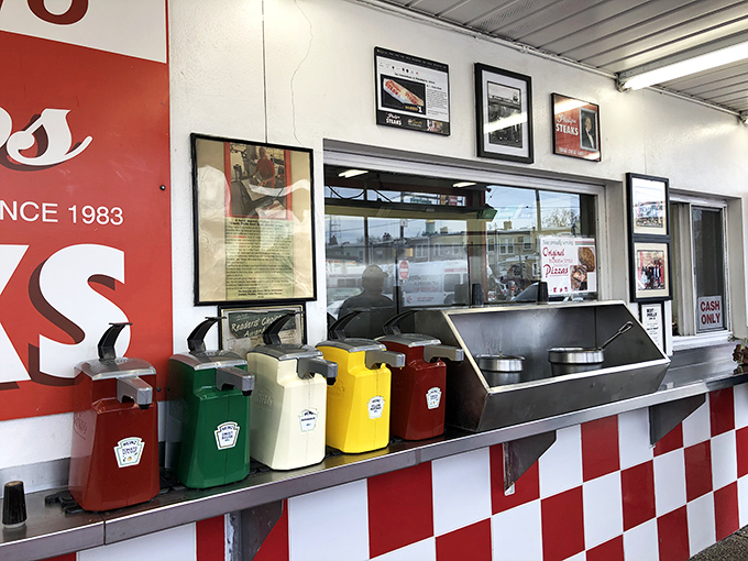 Condiment station standing at attention like tiny soldiers ready for flavor battle. Choose your weapons wisely—some decisions can't be undone.