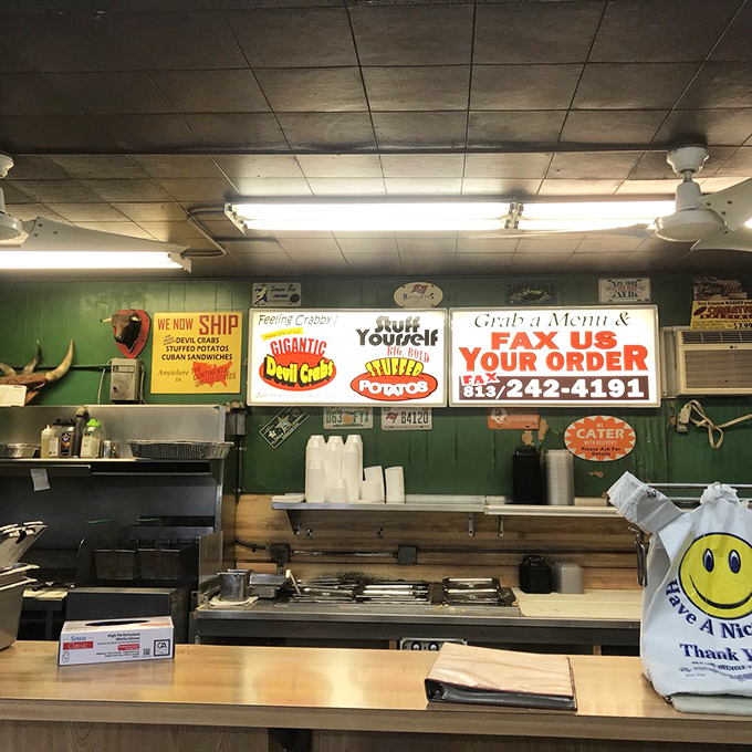 The ordering counter—where dreams become reality and decisions matter. The signs above promise delights that have kept customers returning since 1948.
