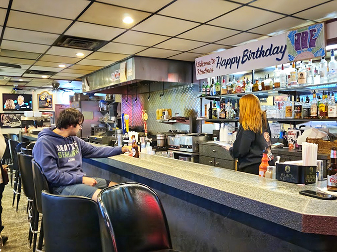 The counter seating offers front-row tickets to the culinary show, where regulars exchange news while waiting for their orders.