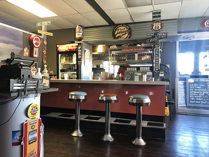 Counter seating that feels like front-row tickets to the best show in town—breakfast theater with a side of local conversation.