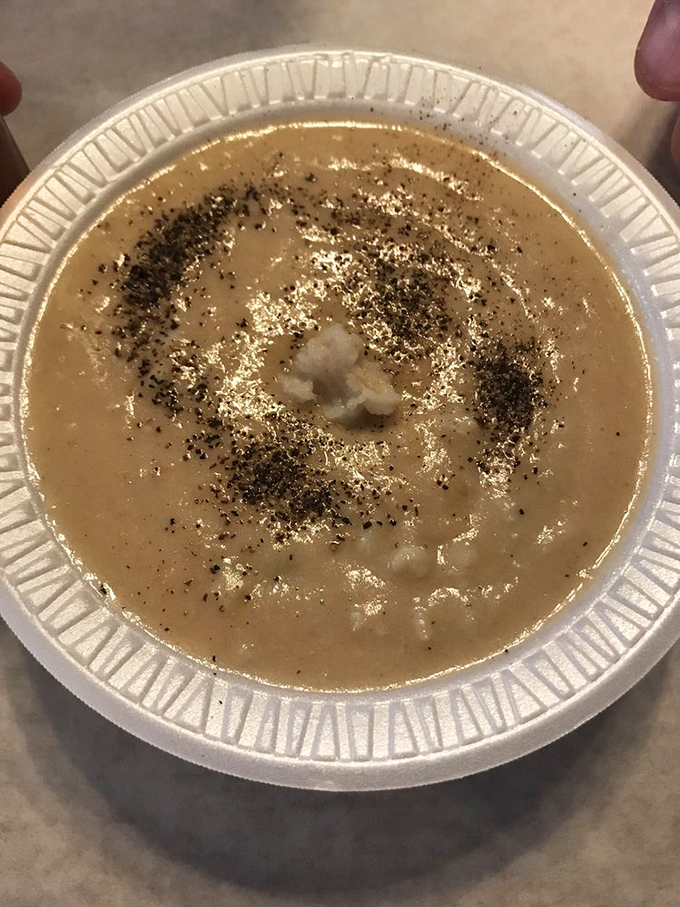 This crab bisque looks like it contains the secrets of the ocean. Rich, velvety, and perfectly seasoned—a spoonful of coastal comfort.