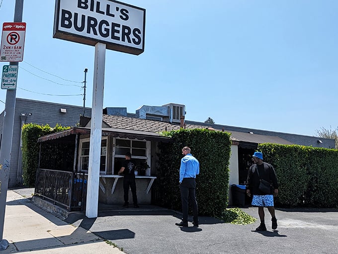 The wait is part of the experience—a burger pilgrimage that separates the casual fans from the true believers.