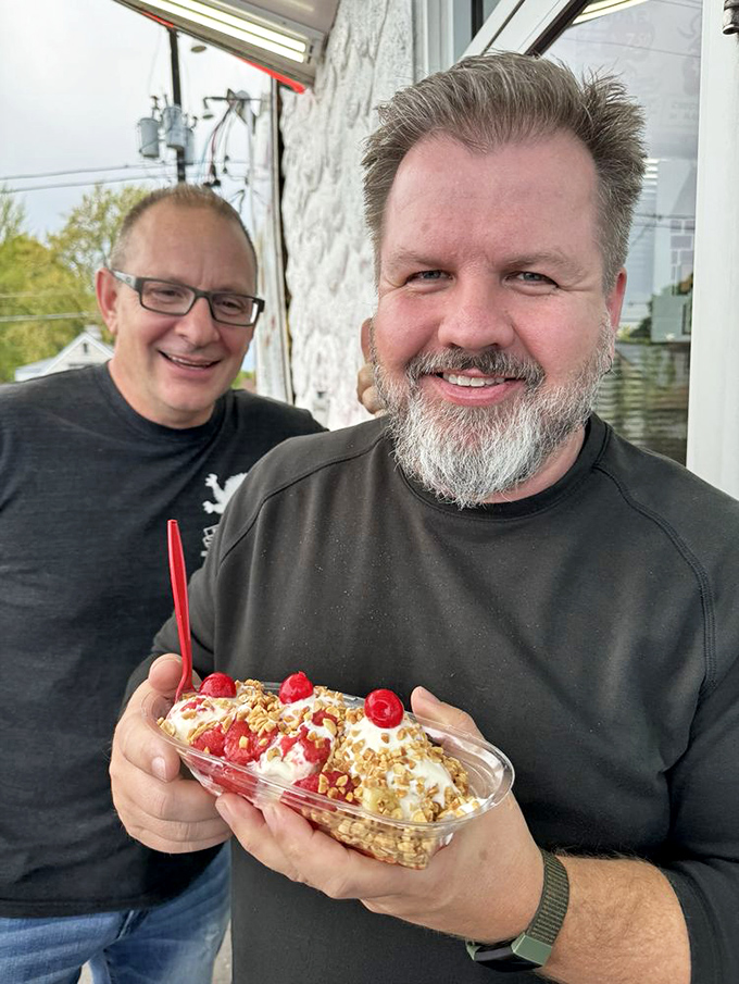 Happy customers clutching their frozen treasures like they've discovered the secret to eternal joy.
