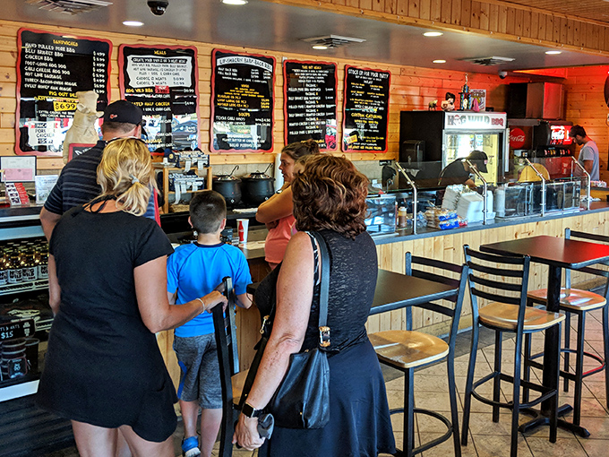 The anticipation in this line is palpable – that moment before barbecue bliss when decisions feel monumental yet impossible to get wrong.