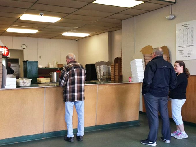 The line forms to the right – a queue that represents the ultimate democracy where everyone waits equally for exceptional pizza.
