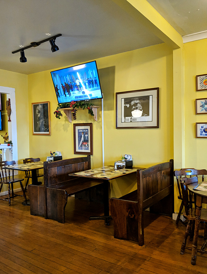 Wooden church pew booths and music memorabilia create a dining space that feels like a delicious intersection of Sunday supper and Saturday night concert.
