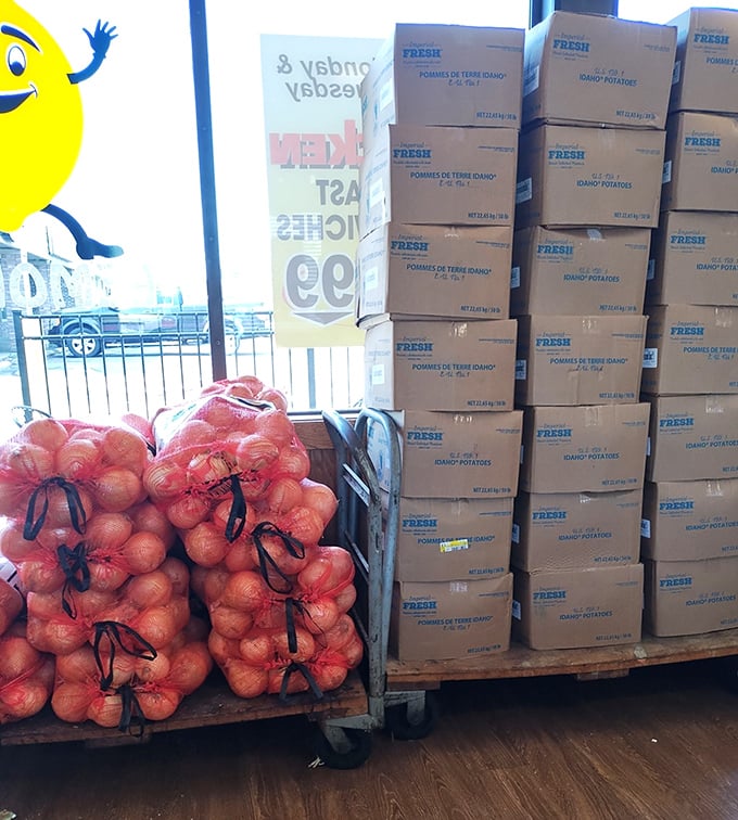 Fresh ingredients stacked high like a promise. Those bags of potatoes and onions aren't just supplies – they're potential.