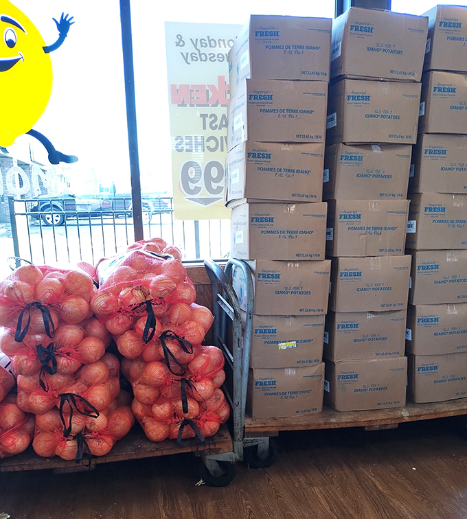 Fresh ingredients stacked high like a promise. Those bags of potatoes and onions aren't just supplies – they're potential.