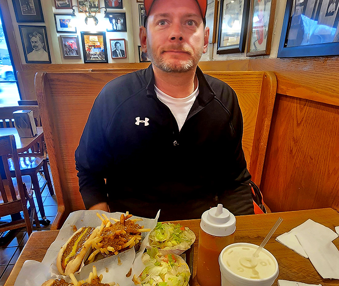 Hot dogs, fries, and coleslaw—the trifecta of comfort food perfection that keeps loyal customers coming back decade after decade.