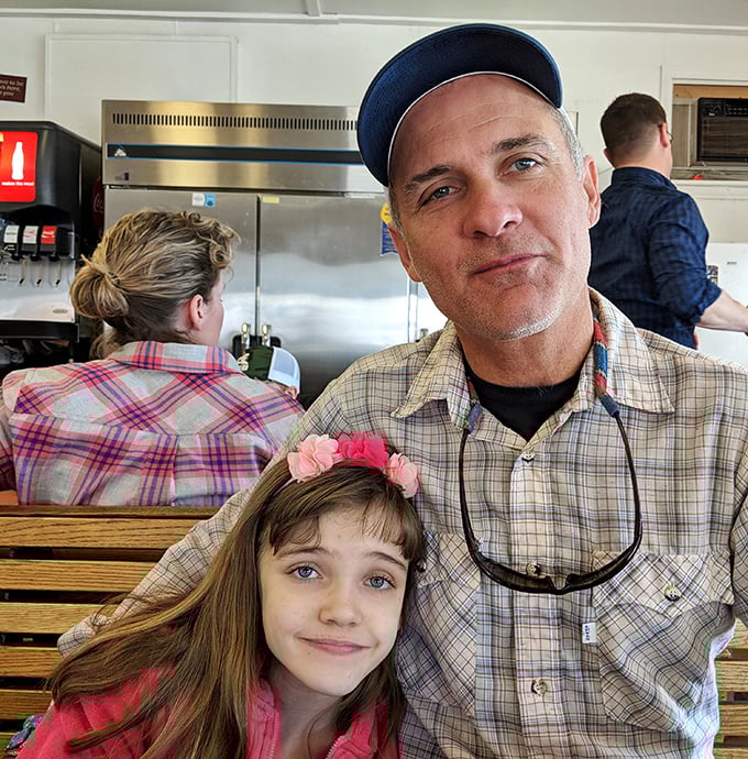 Happy diners enjoying their breakfast together – this is what community dining looks like at its finest.