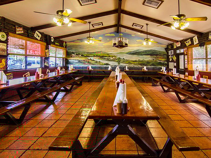 Long communal tables beneath ceiling fans practically beg you to make new friends united by the universal language of great barbecue.