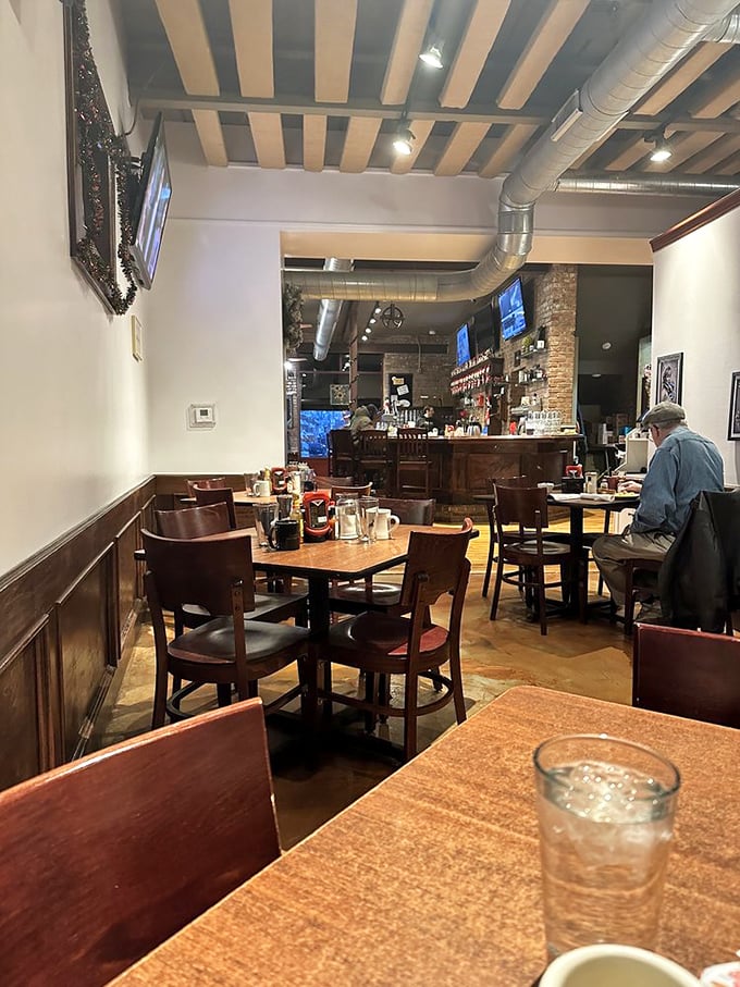 The dining room whispers "stay awhile" with its wooden wainscoting and comfortable chairs—a morning sanctuary for the breakfast devoted.