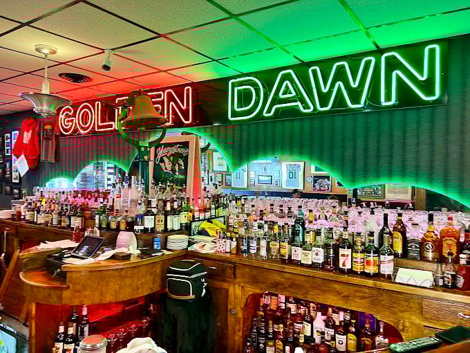 The neon glow behind the bar isn't just lighting—it's a beacon that's been guiding hungry Youngstown residents home for decades.