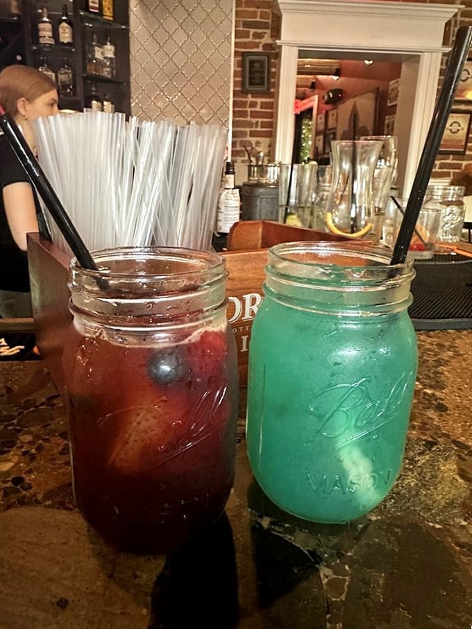 Mason jar cocktails that look like they contain equal parts booze and joy. One red, one blue—like delicious adult snow cones with a kick.