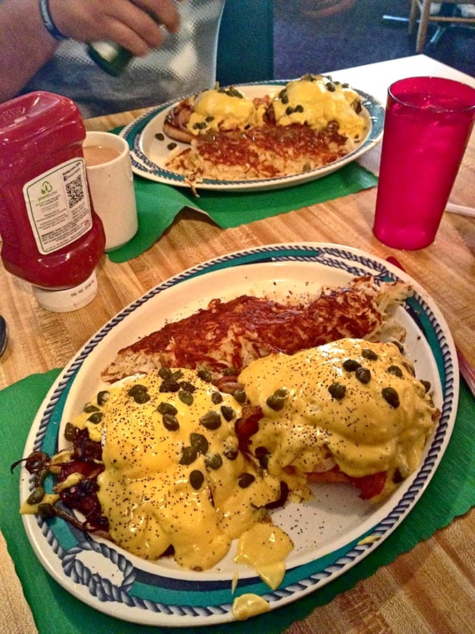 Eggs Benedict with capers – where hollandaise sauce flows like liquid gold over perfectly poached eggs. This is breakfast worthy of your Sunday best.