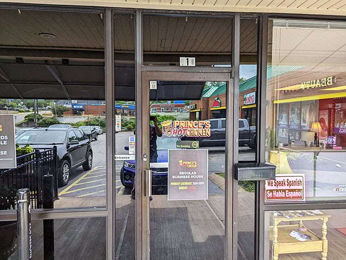 The entrance to Prince's—where countless brave souls have entered with confidence and exited with newfound respect for the power of cayenne.