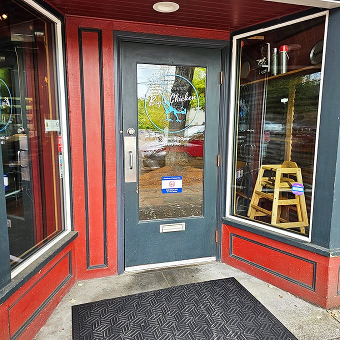 The entrance to chicken paradise doesn't need to be fancy. That blue neon sign is the culinary equivalent of "follow the yellow brick road."