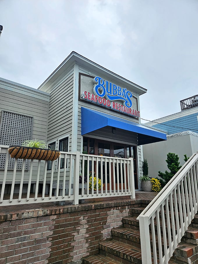 Even on cloudy days, that blue sign shines like a maritime beacon, guiding hungry travelers to seafood salvation.