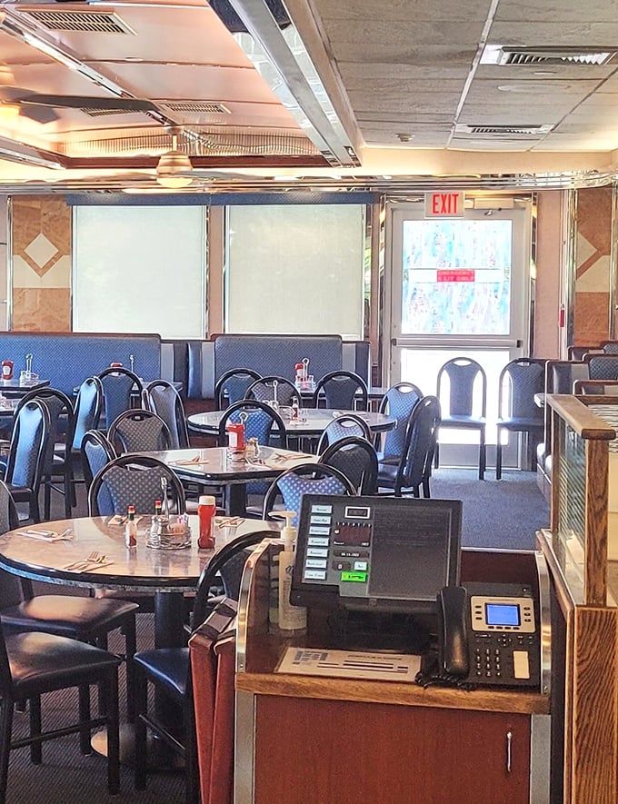 The dining room waits patiently between rushes, tables set and ready for the next wave of hungry patrons seeking comfort food salvation.