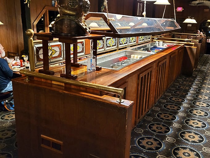 The salad bar isn't just a prelude—it's a beautifully crafted opening act with stained glass accents worthy of a maritime cathedral.