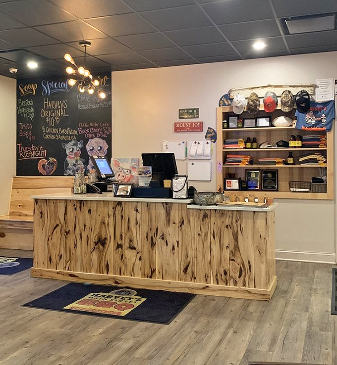 The rustic wooden counter welcomes you like an old friend, while the chalkboard teases daily specials that make decision-making the day's most delicious challenge.
