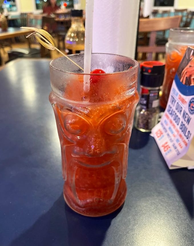 The tiki glass isn't just a vessel—it's a promise of vacation vibes, even if you're just on lunch break from the office.