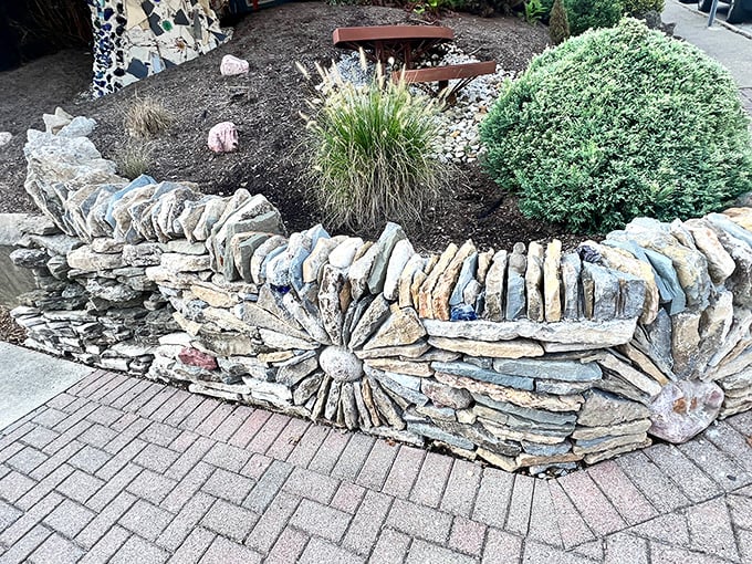 Stone walls flow like frozen waterfalls, proving that landscaping can be sculpture when imagination takes the wheel.