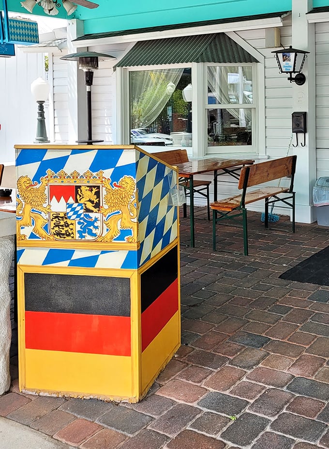 The host stand proudly displays Bavaria's blue and white diamond pattern—Germany's flag colors standing guard at this culinary outpost in Mount Dora.