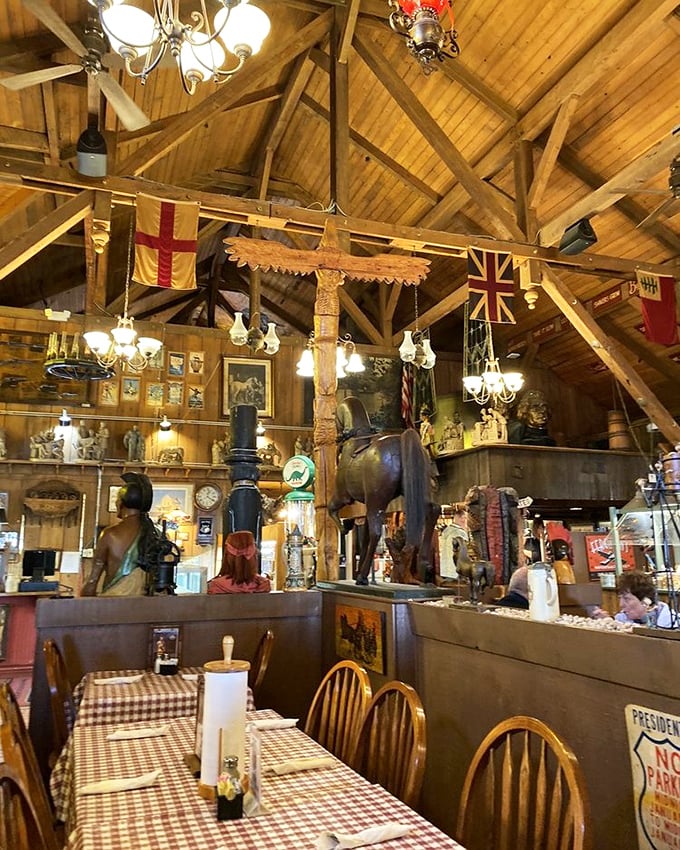 Vaulted ceilings, international flags, and enough antiques to film a period drama – dining here is part meal, part time travel experience.