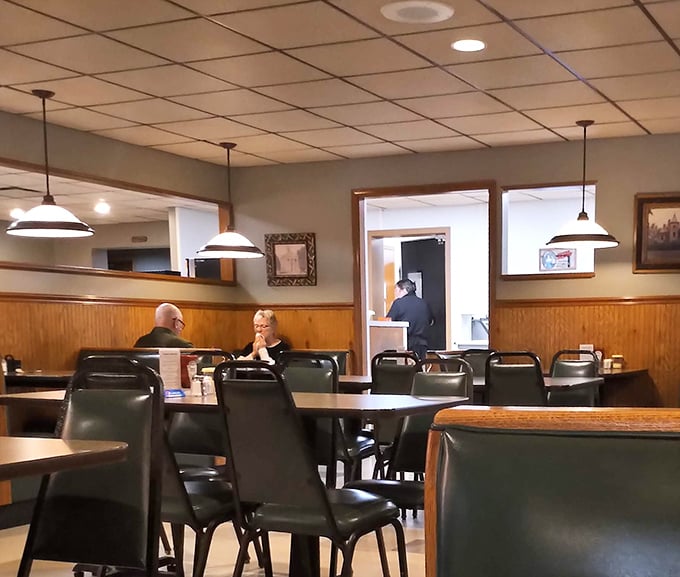 The dining room layout—an exercise in practical comfort. Every seat offers equal opportunity access to the pie case and coffee refills.