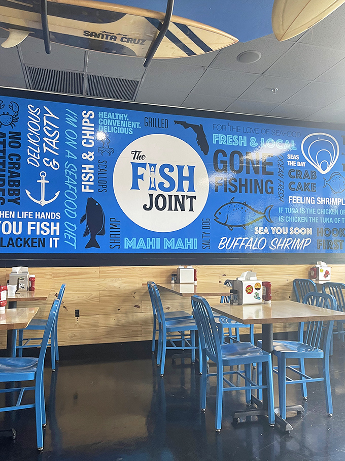 The dining room feels like the beach without the sand in your shorts – bright, airy, and promising something delicious at every blue-chaired table.